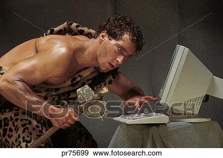 Stock Photograph of caveman with computer pr75699 - Search Stock ...