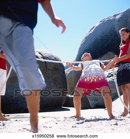 Pictures of a group of young teenagers doing the limbo x15950258 ...