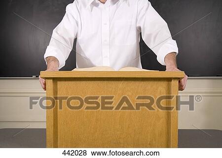 Pictures of Lecturer standing behind lectern 442028 - Search Stock ...