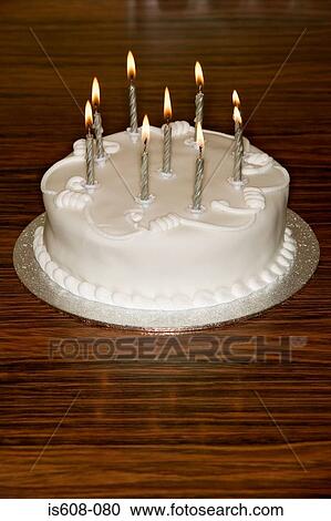Birthday cake on dining table Stock Image | is608-080 | Fotosearch