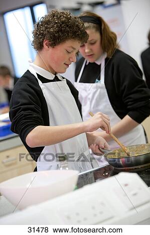 Students cooking in home economics class Stock Photo | 31478 | Fotosearch