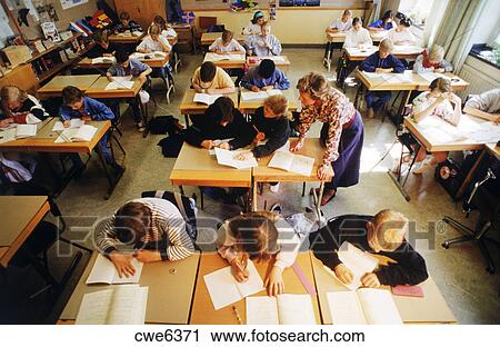 Elementary School Kids Classroom Reading Writing Stock